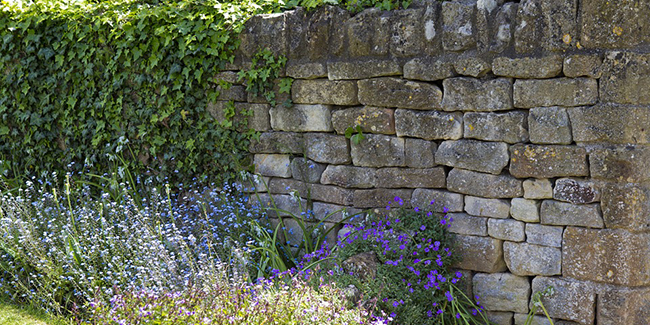 Mur mitoyen : qui prend en charge les travaux de rénovation